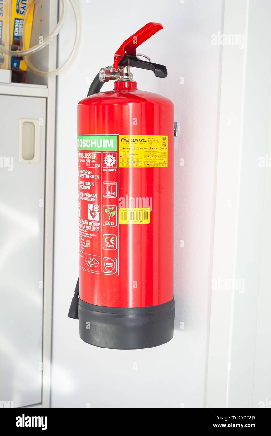 Fire extinguisher for extinguishing small fires Stock Photo - Alamy