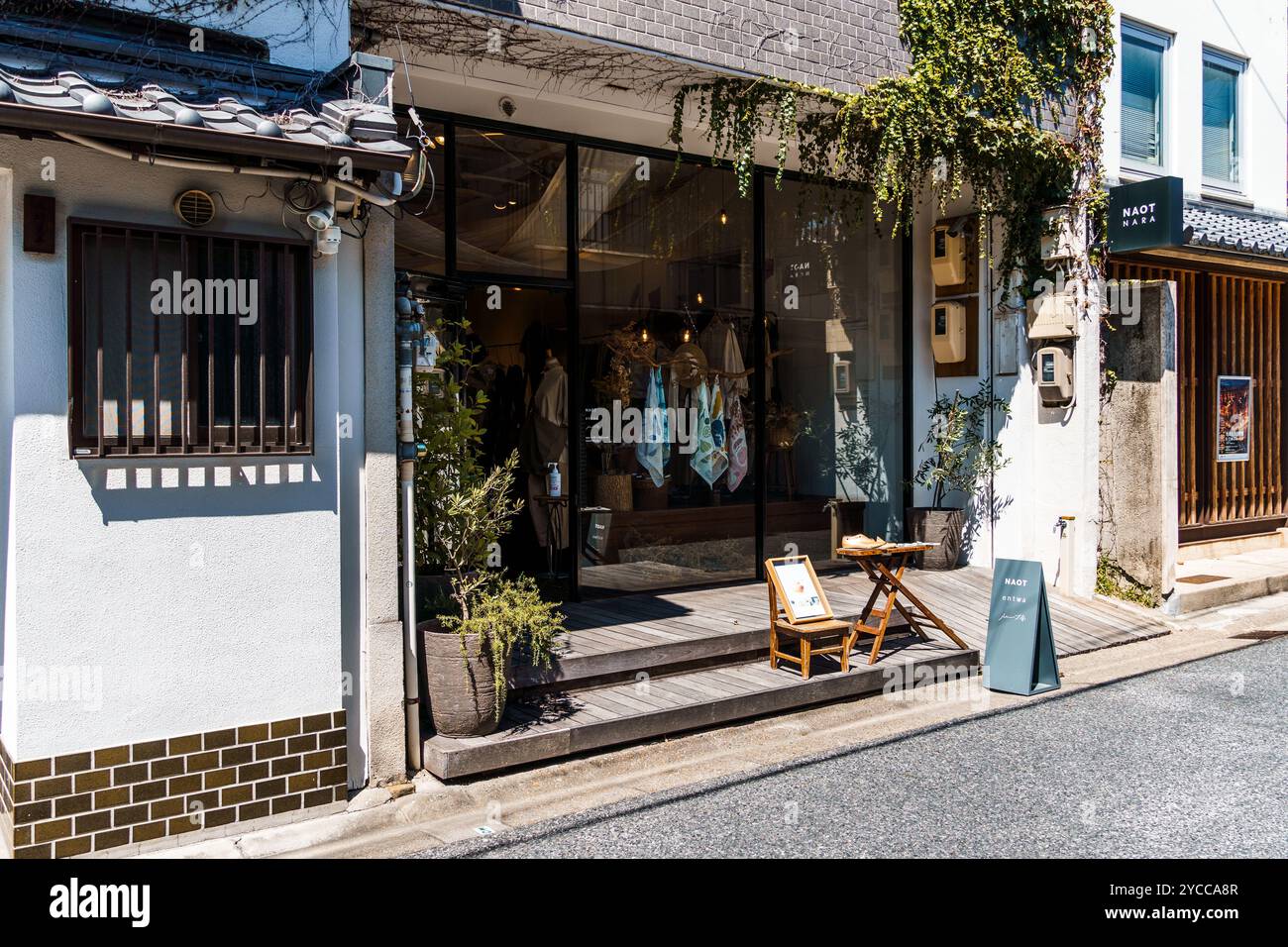 Nara, Japan - August 14, 2024: A traditional narrow street in Nara ...