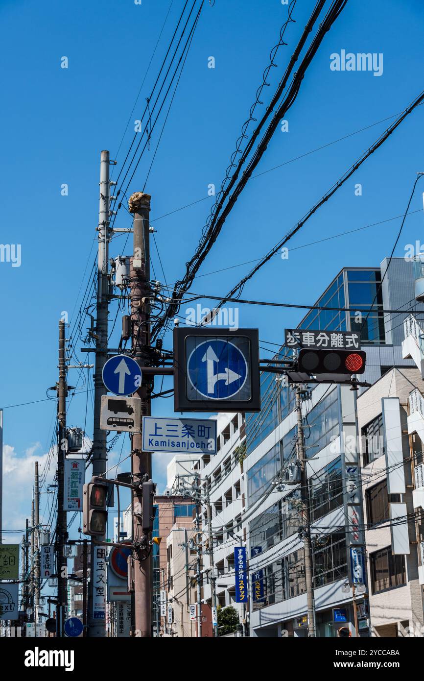 Nara, Japan - August 14, 2024: A bustling intersection in downtown Nara ...