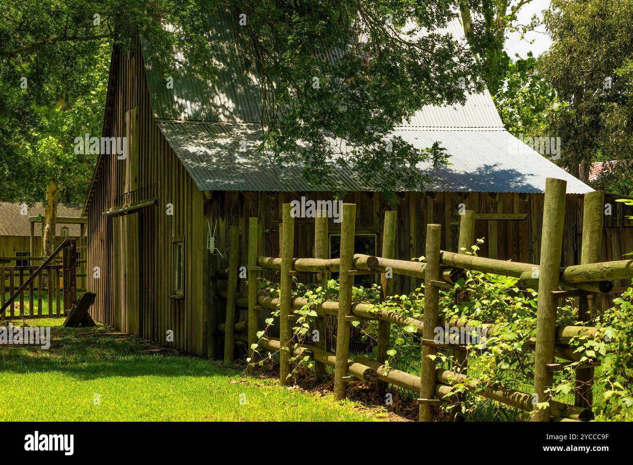 Nice country setting of a Barn and fence at Armand Bayou Nature Center ...