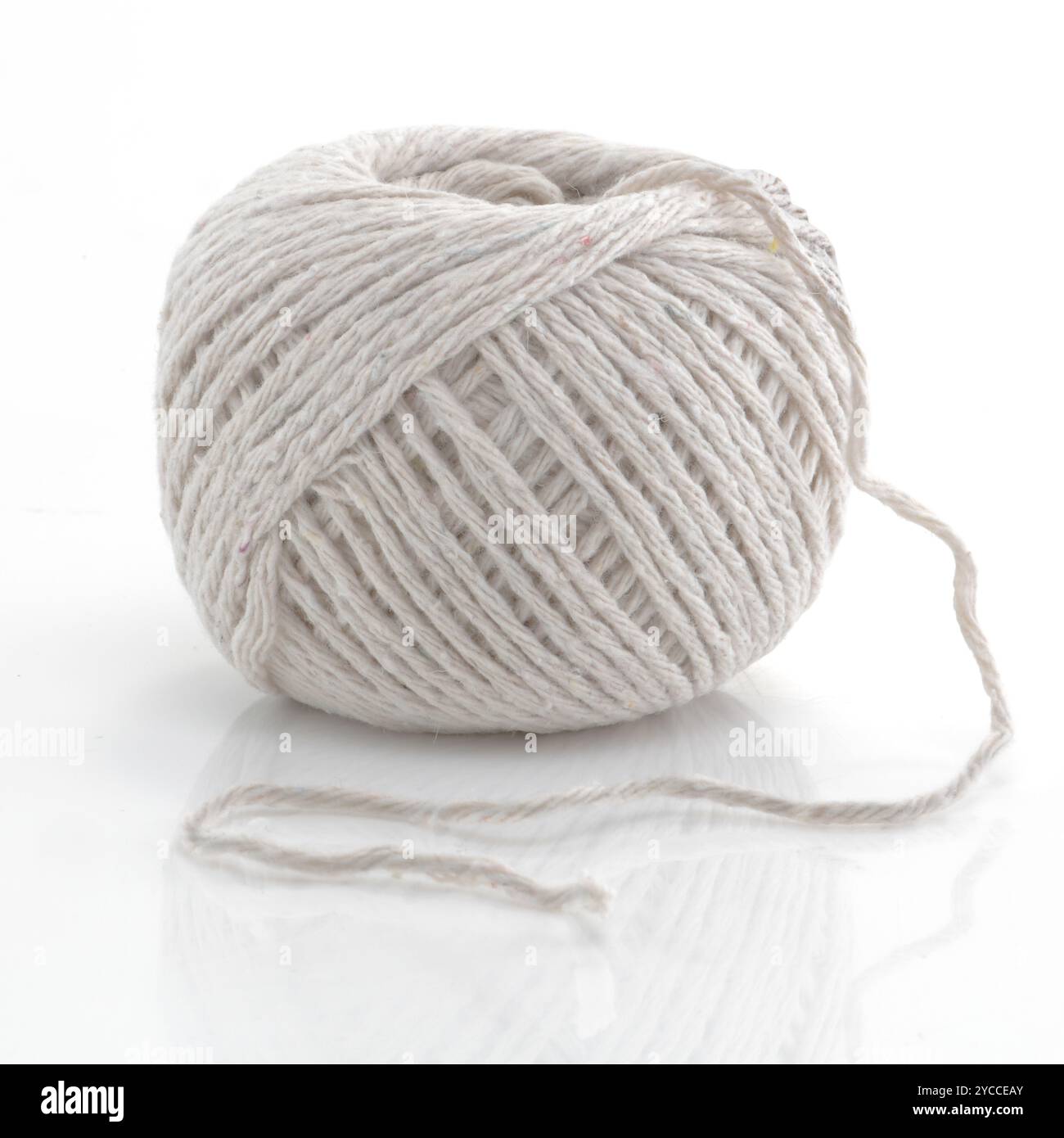 Grey ball of string on white background Stock Photo - Alamy
