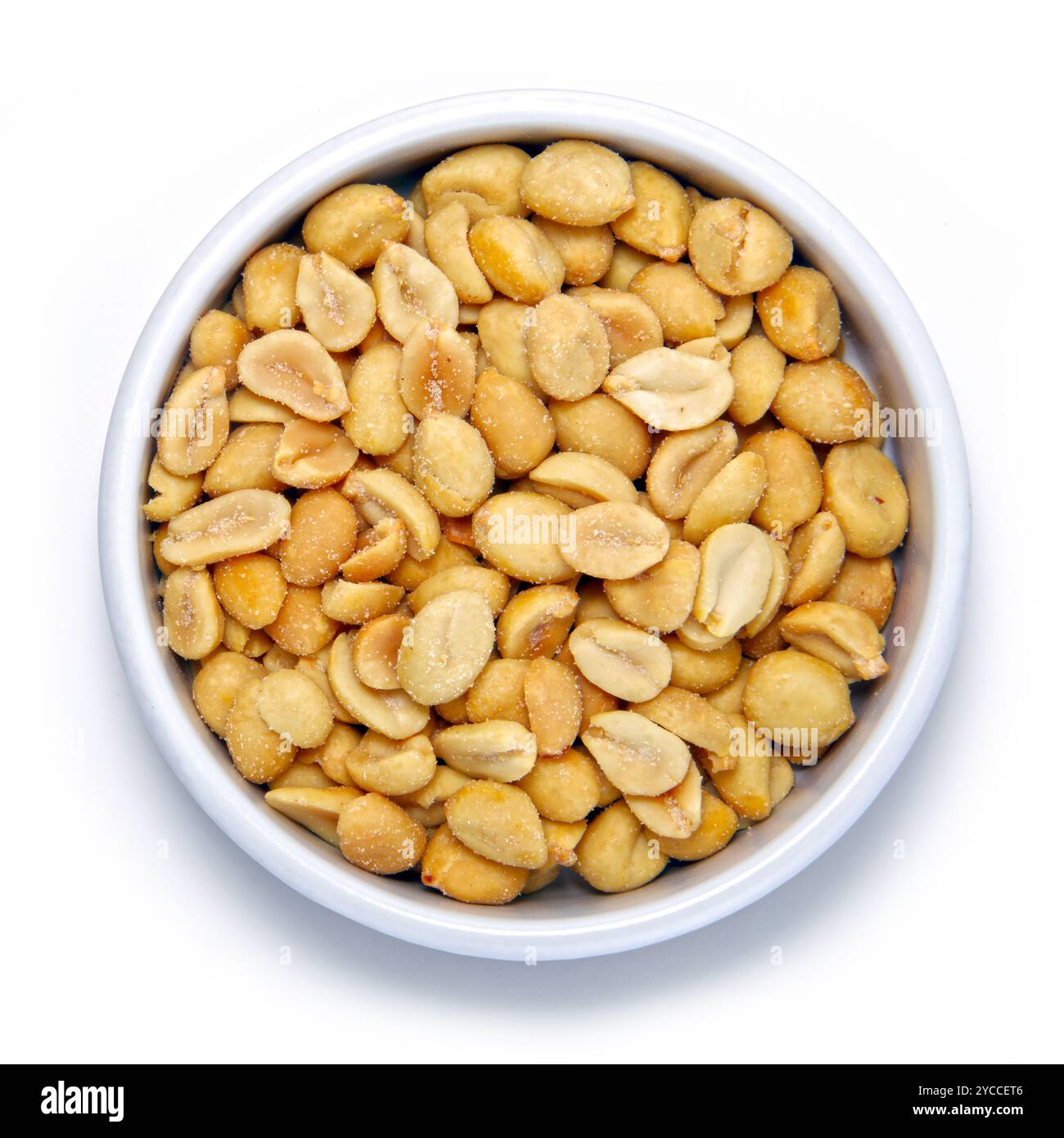 Salted peanuts in round container on white background Stock Photo - Alamy