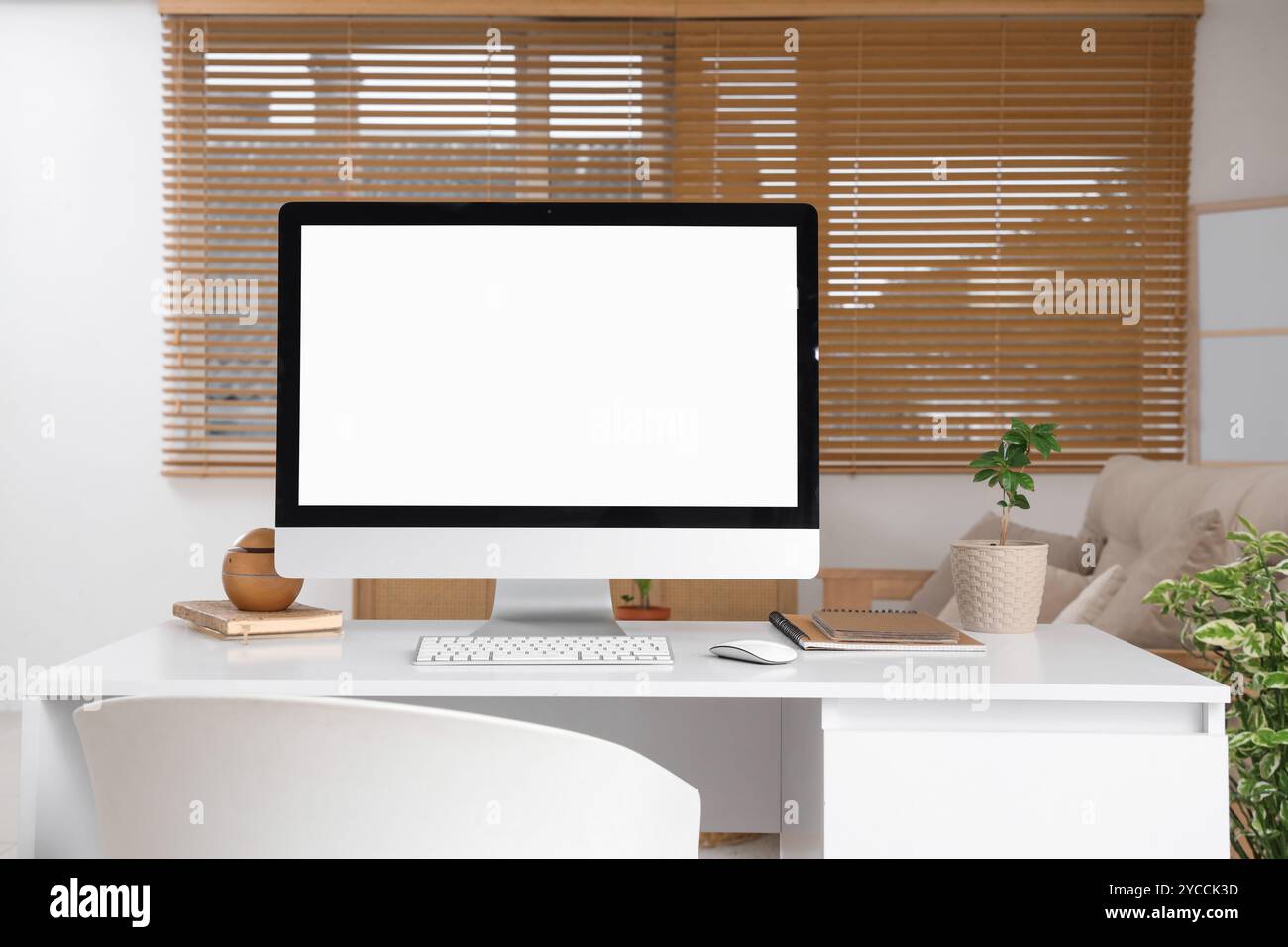 Modern workplace with computer monitor in interior of room Stock Photo ...