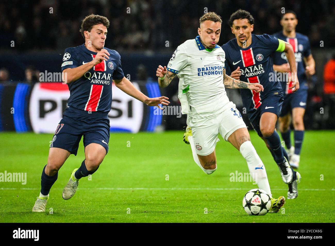 Paris, France, France. 22nd Oct, 2024. Joao NEVES of PSG, Noa LANG of PSV Eindhoven and ...
