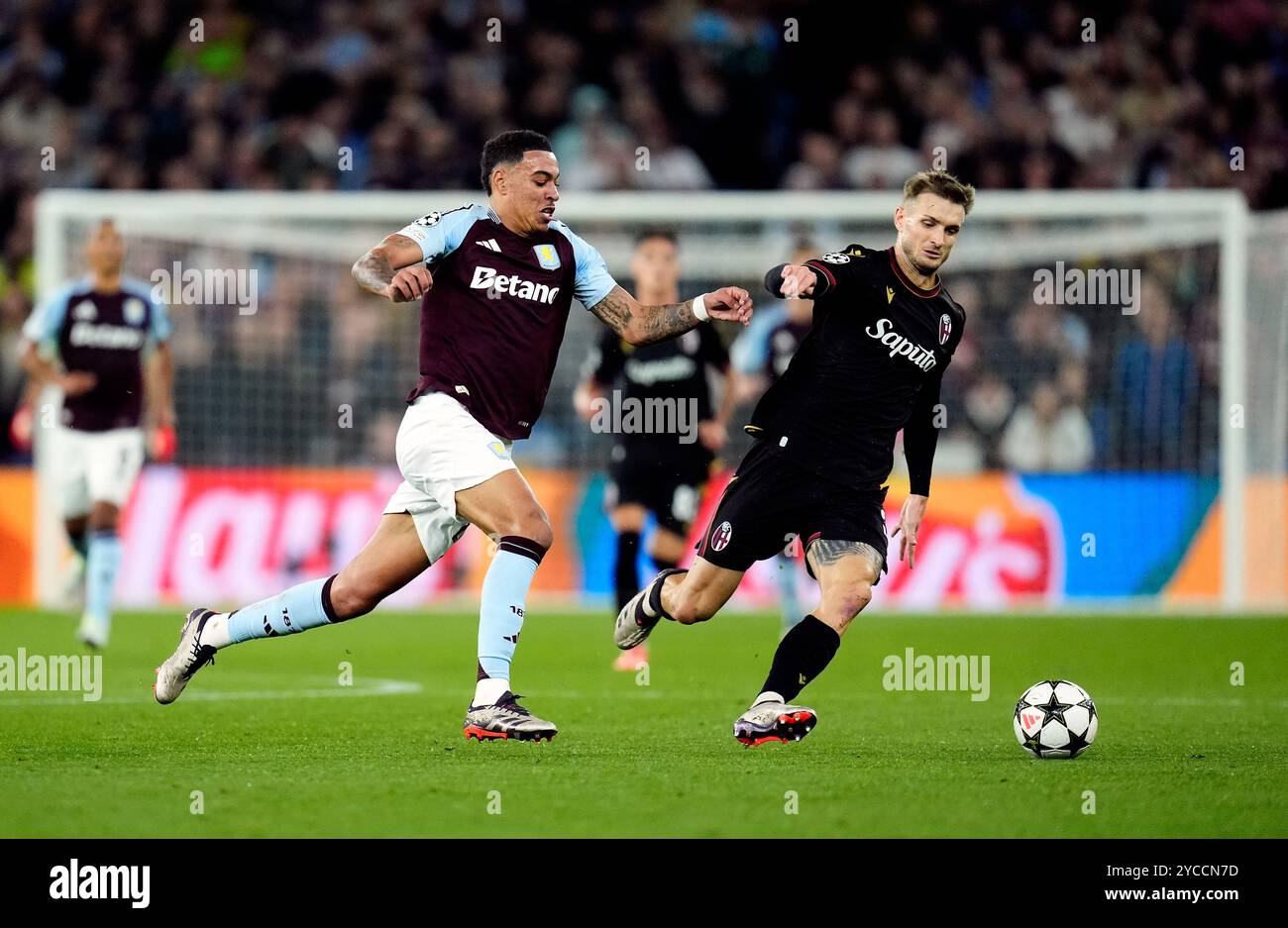 Aston Villa's Morgan Rogers and Bologna's Stefan Posch (right) during ...
