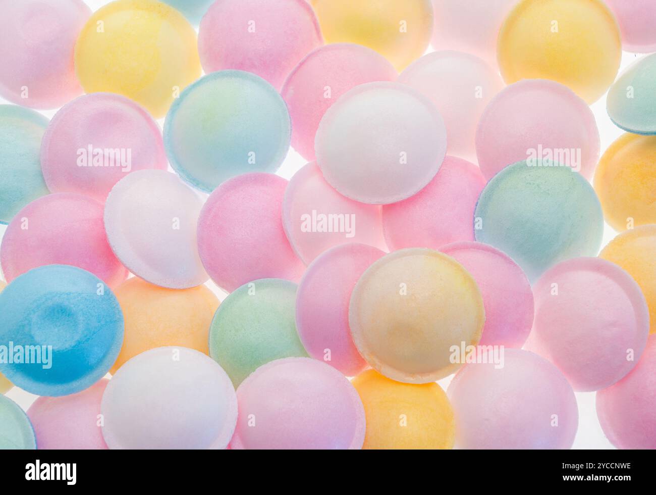 Background of sherbet filled flying saucer candy Stock Photo - Alamy