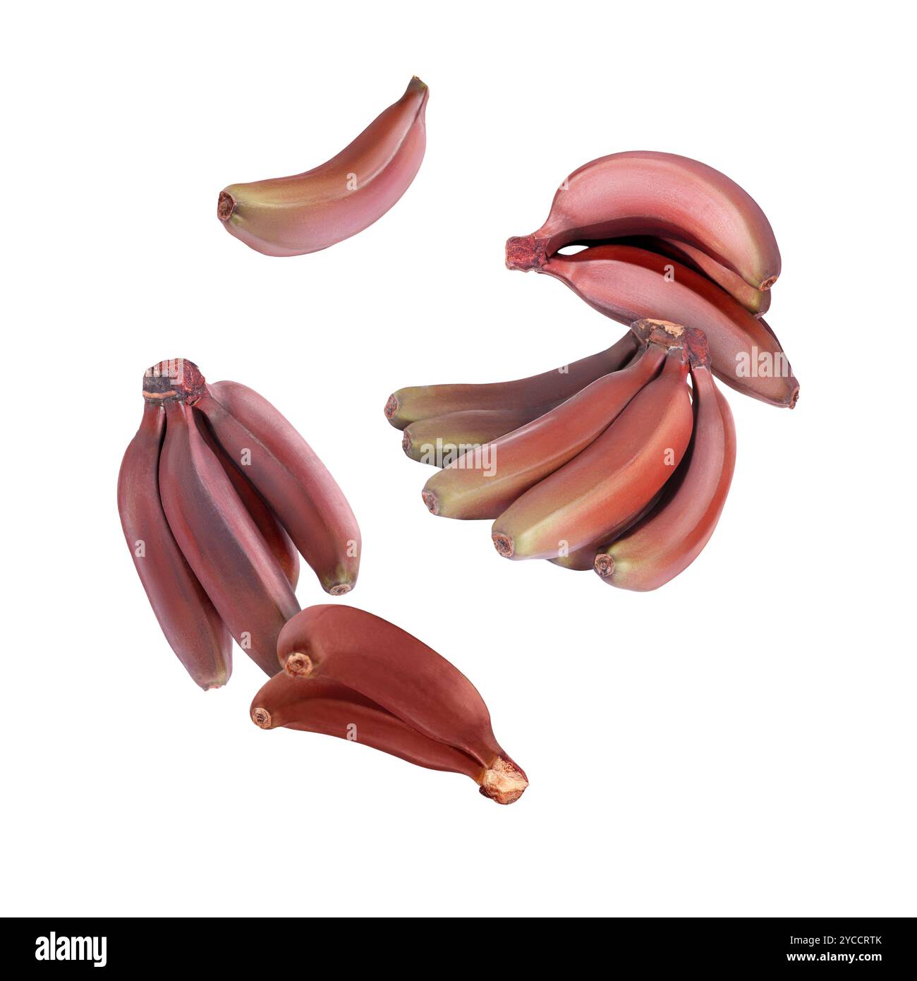 Red baby bananas in air on white background Stock Photo - Alamy