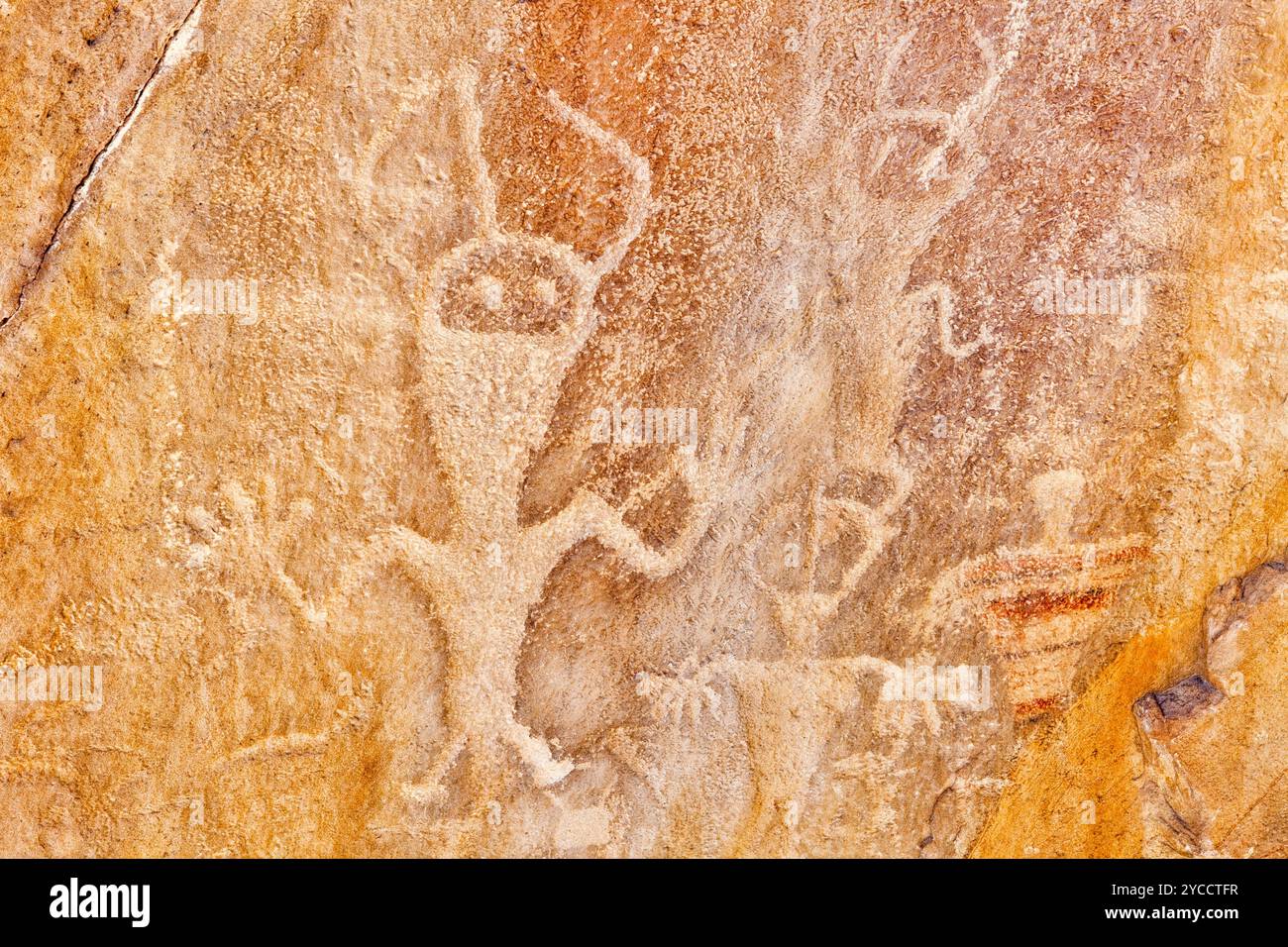 A close-up of Native American petroglyphs on rock at Dinosaur National ...