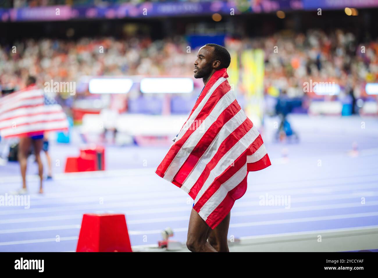 Daniel Roberts celebrating her victory with her country's flag at the ...