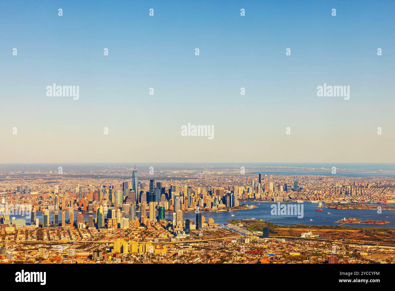 Aerial view of Lower Manhattan skyline with skyscrapers and Statue of ...