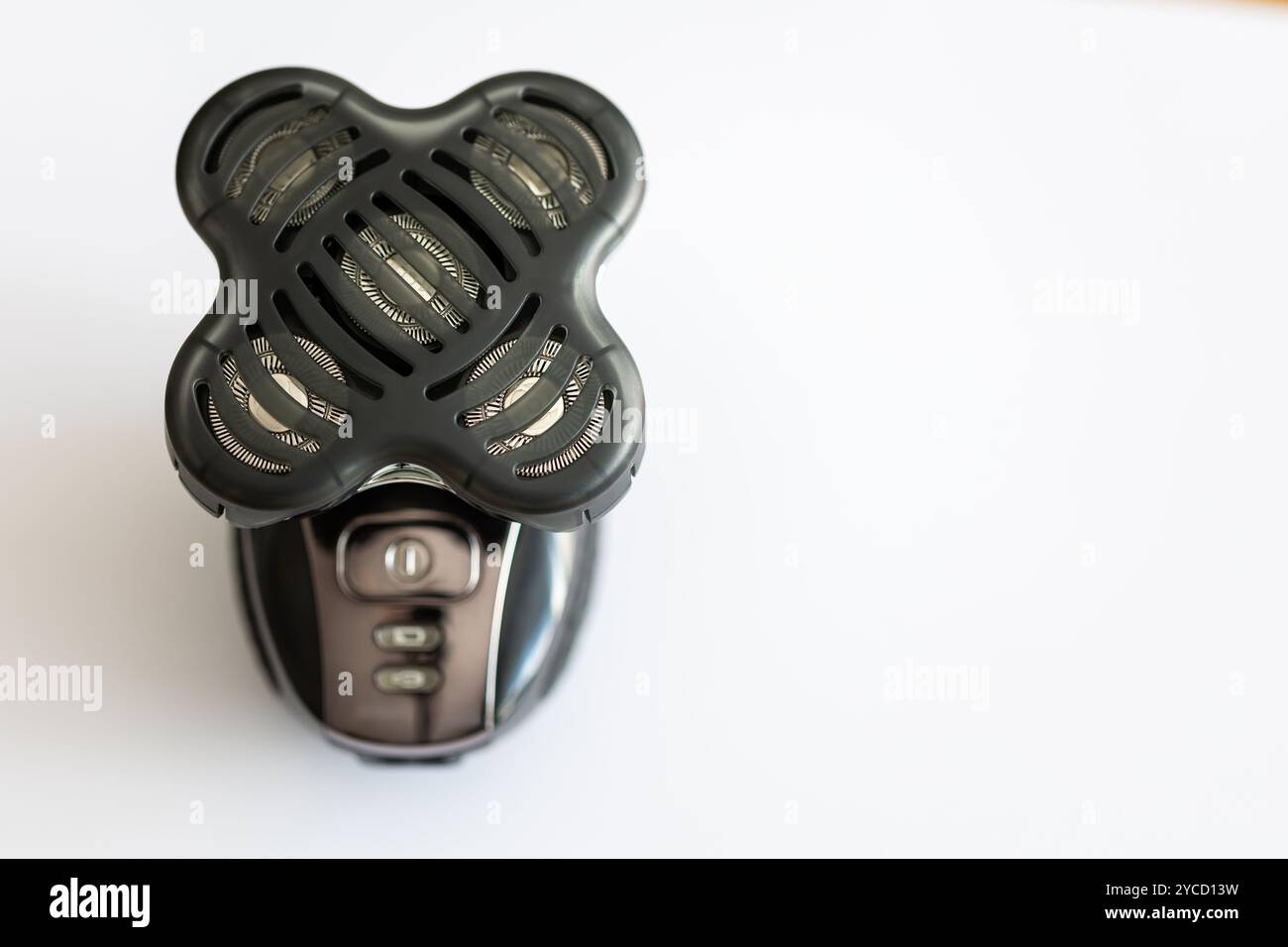 Head shaver on a white background. Cutting blades protected by plastic ...