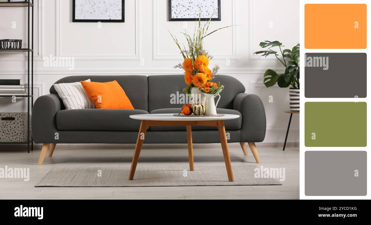 Stylish living room with comfortable sofa near white wall. Interior ...