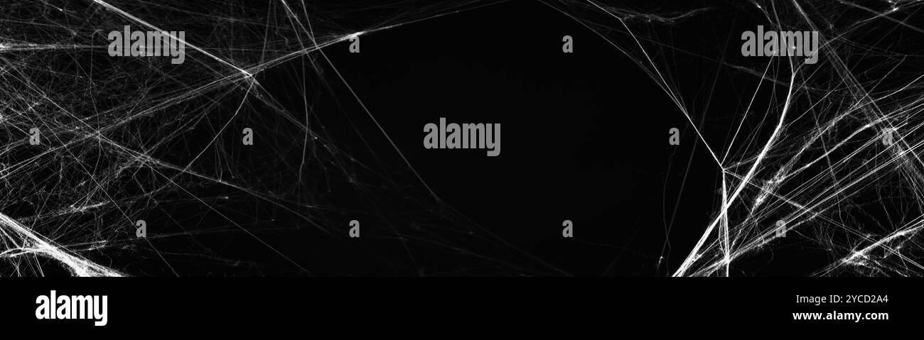 White cobweb on black background, banner design Stock Photo - Alamy