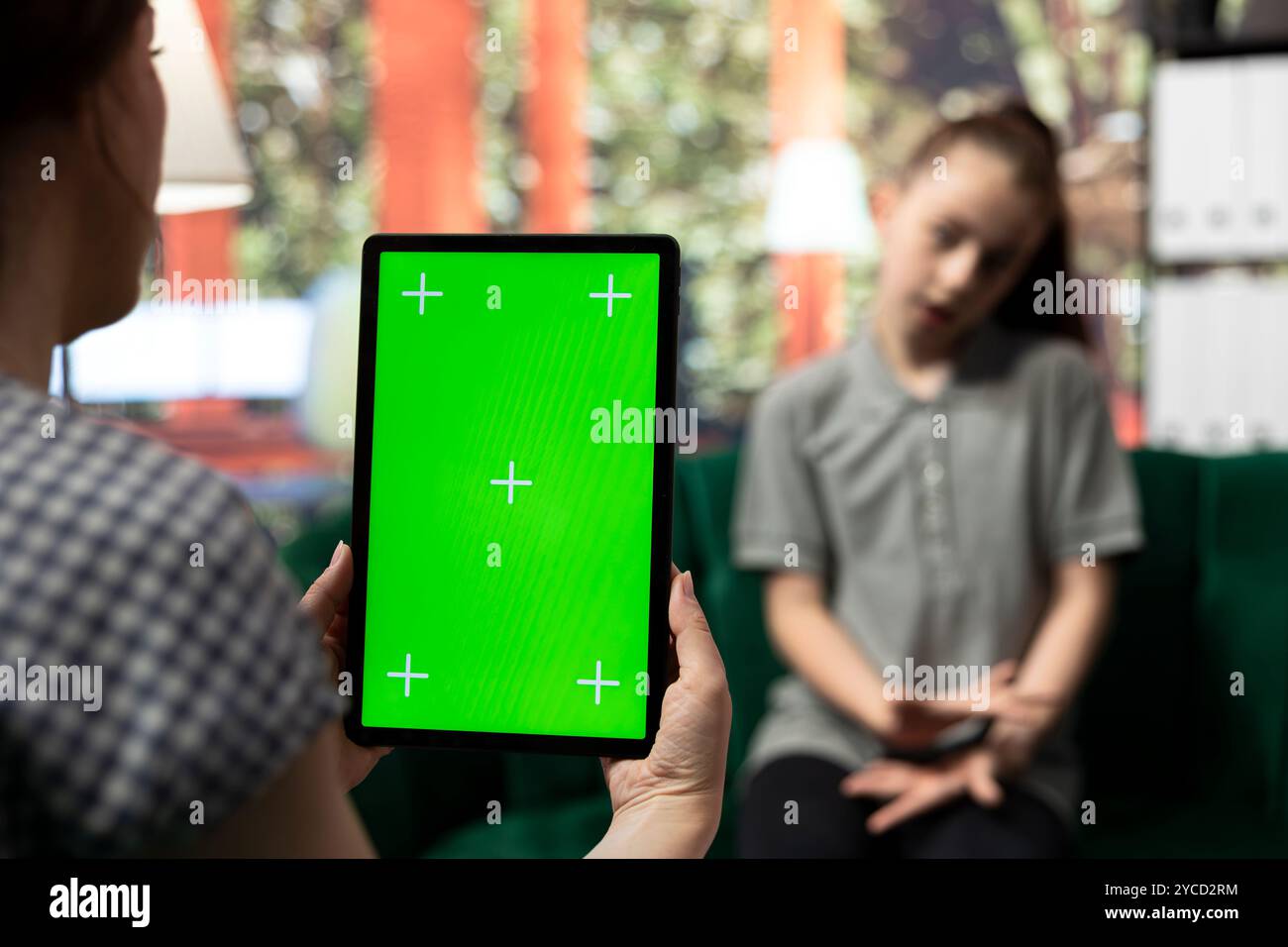 Teenager undergoing therapy for depression next to isolated chroma key ...