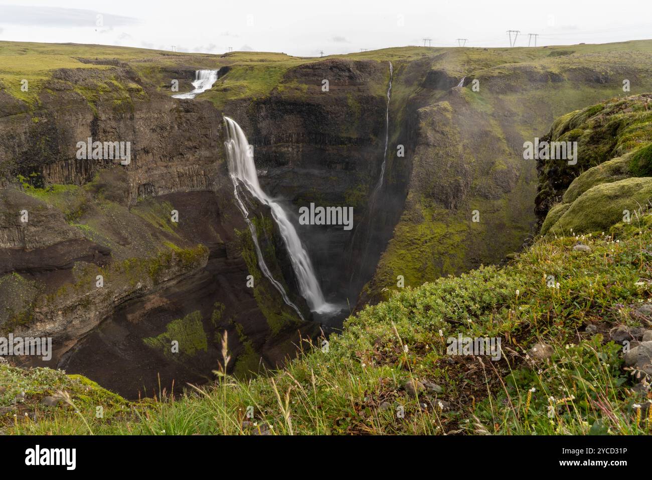Majestic Waterfall Cascading from Rugged Cliffside Stock Photo - Alamy