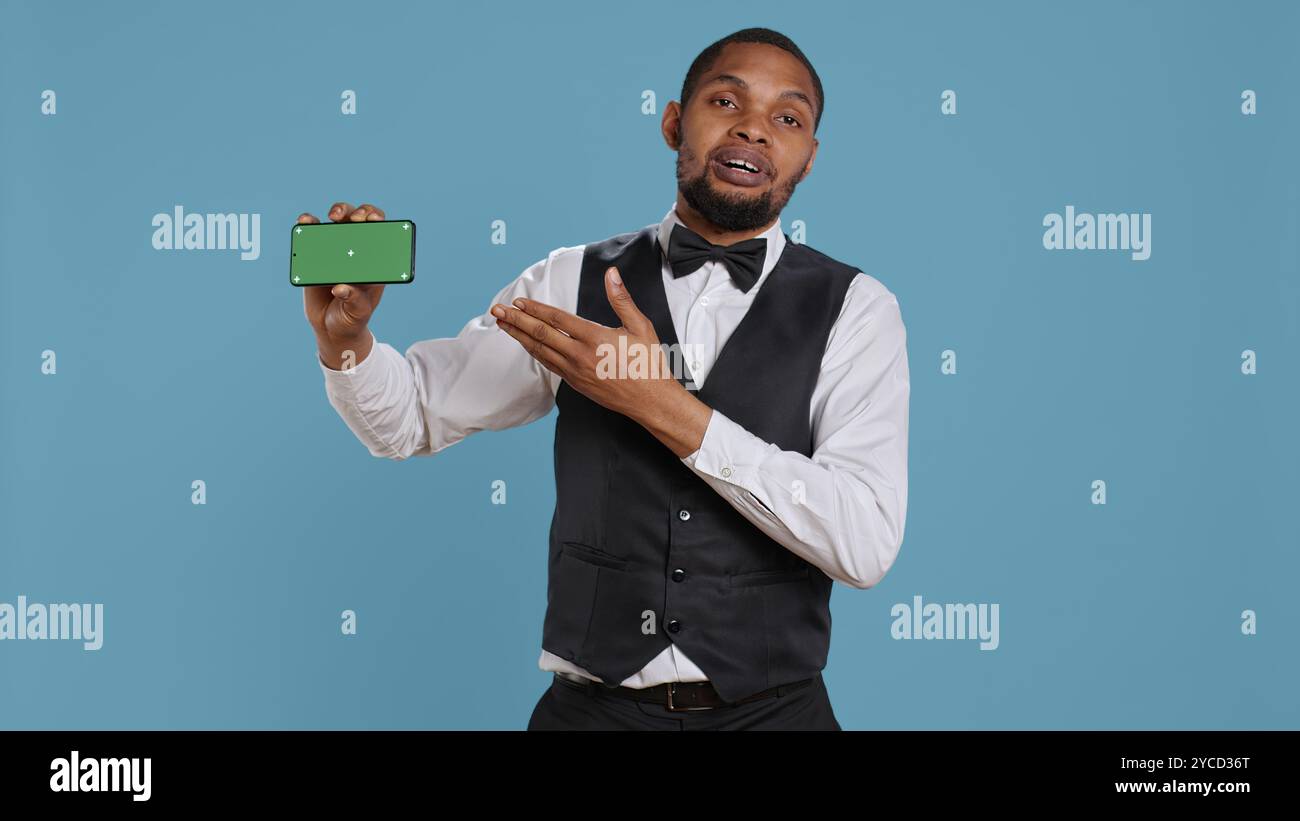 Bellman receptionist presenting an isolated mockup screen in studio ...