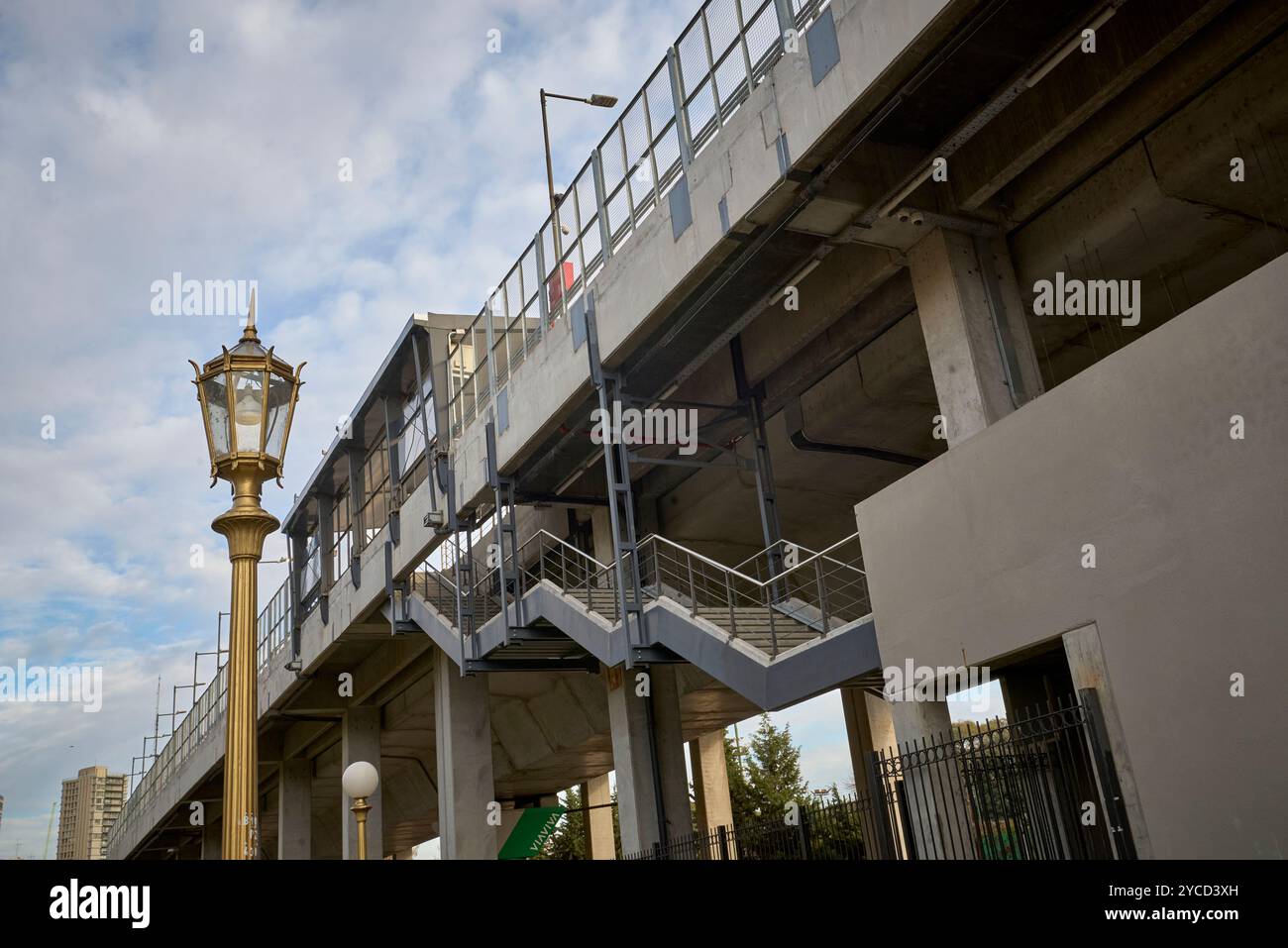 Photograph taken from below the train tracks, the train platform and ...