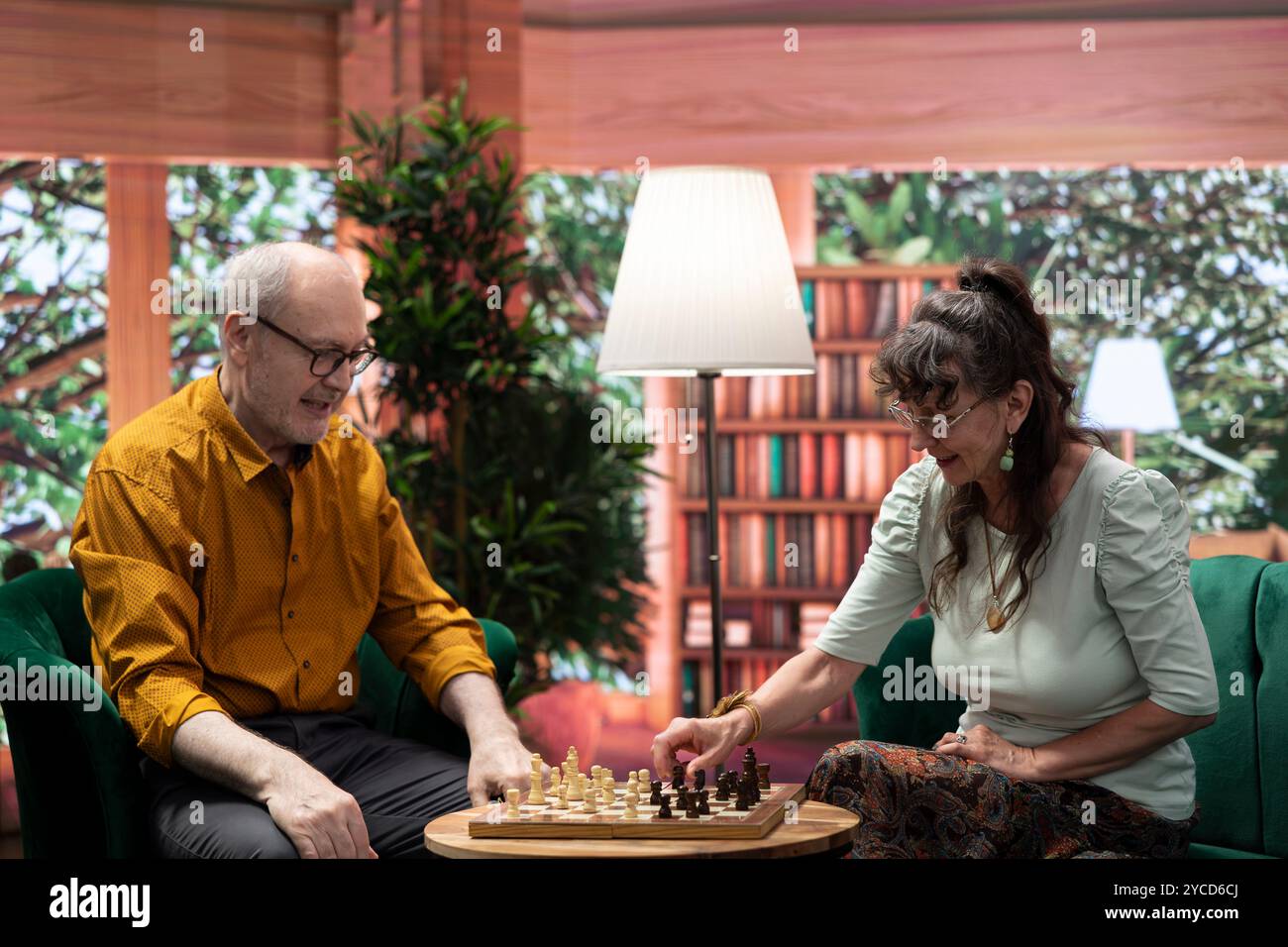 Senior couple playing board games hi-res stock photography and images ...
