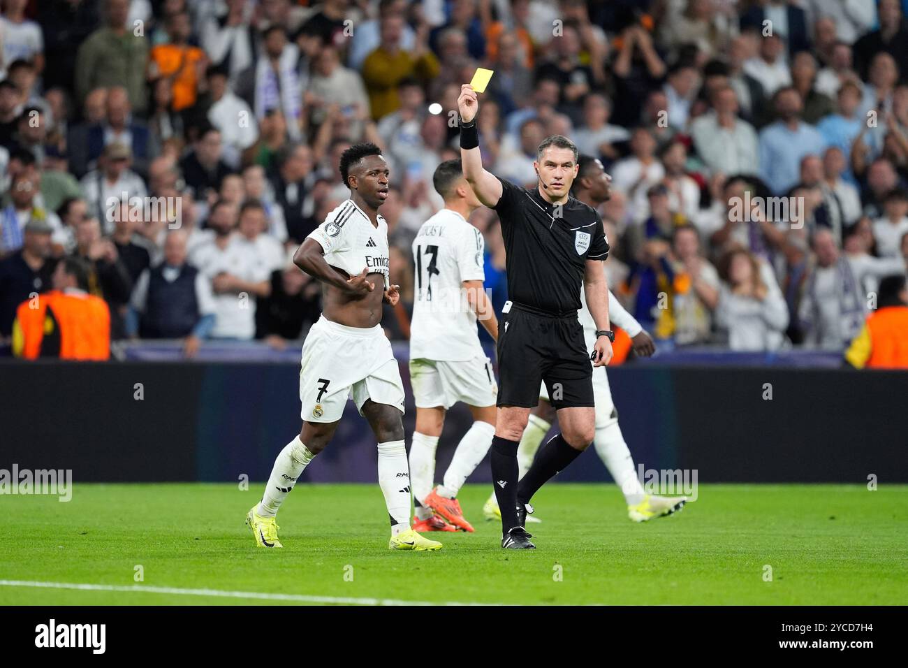 Vinicius Junior of Real Madrid see the yellow card after celebrating a ...