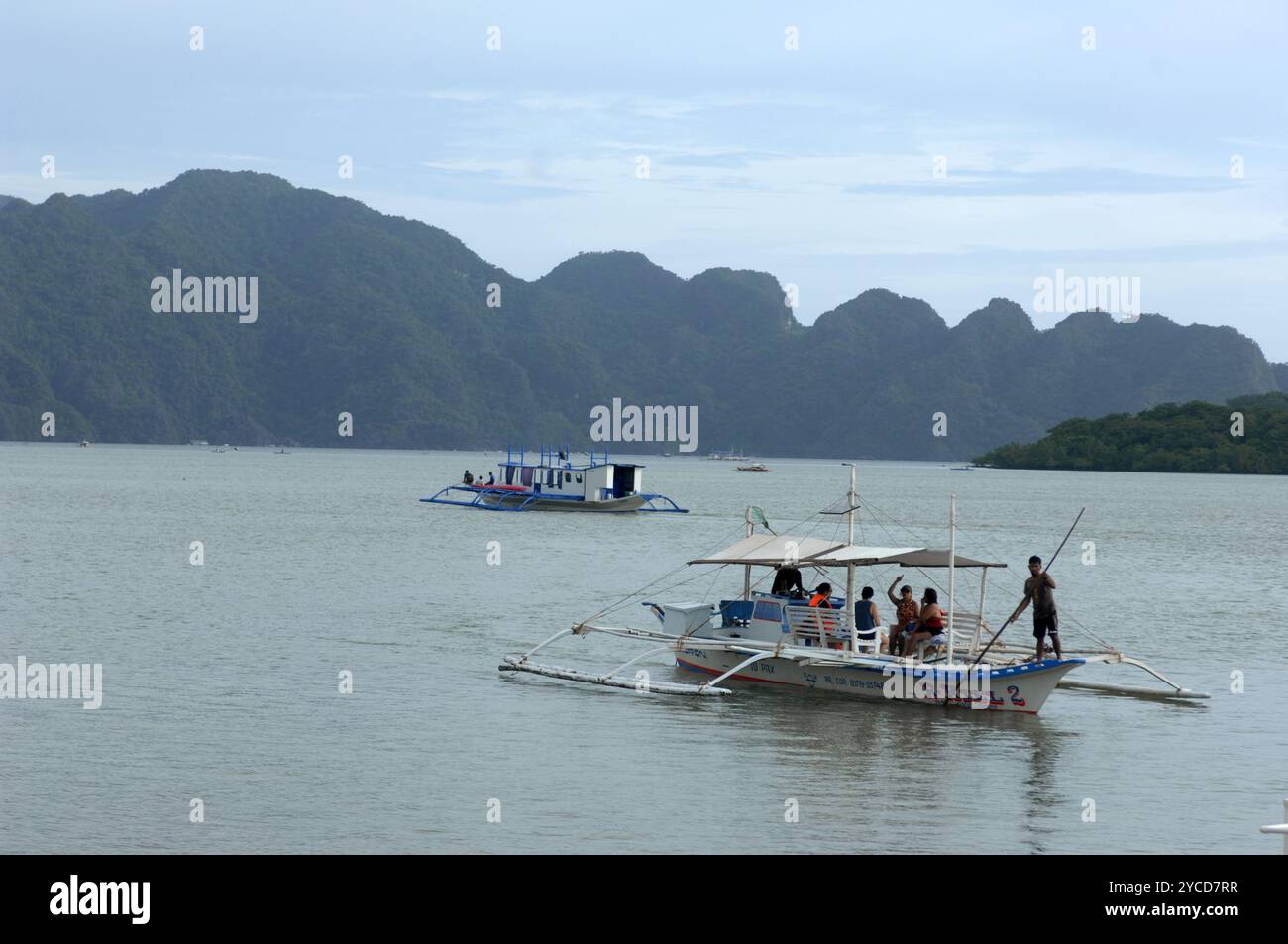 Small water taxi about to dock at Coron, transporting locals, Coron ...