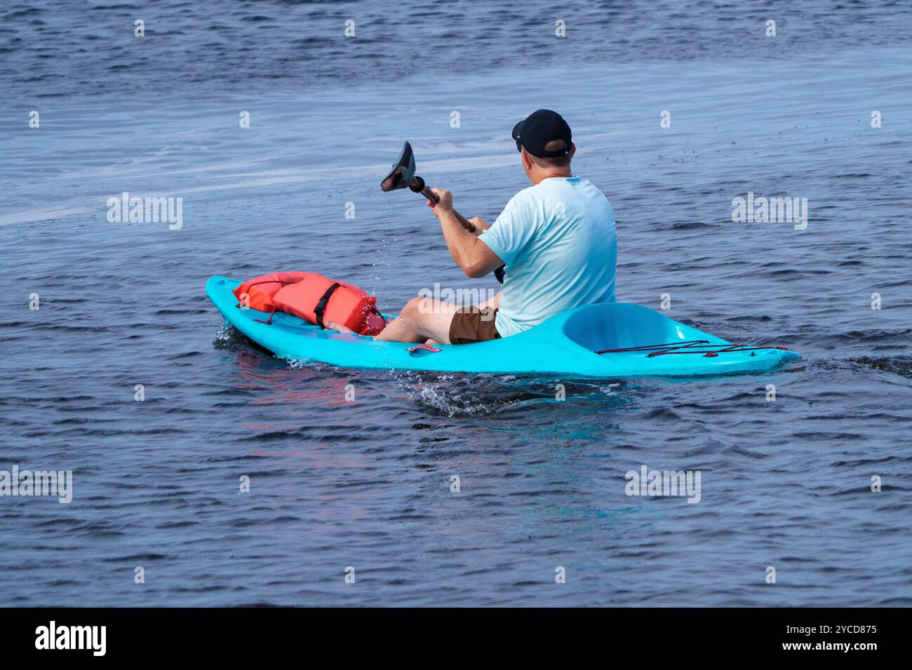 Man paddling kayak fishing hi-res stock photography and images - Alamy