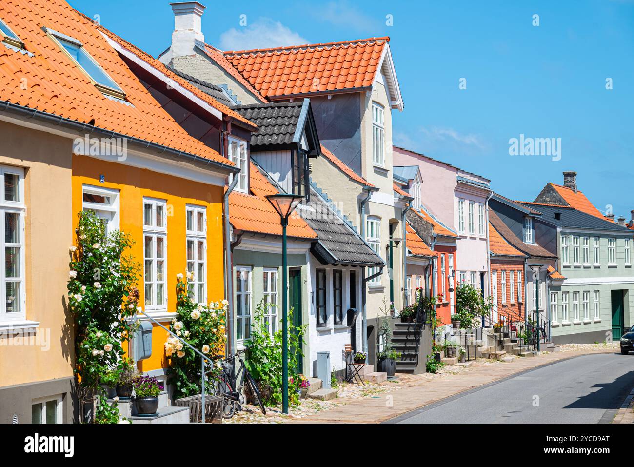Buildings in city center of Middelfart in Denmark on a sunny summer day ...