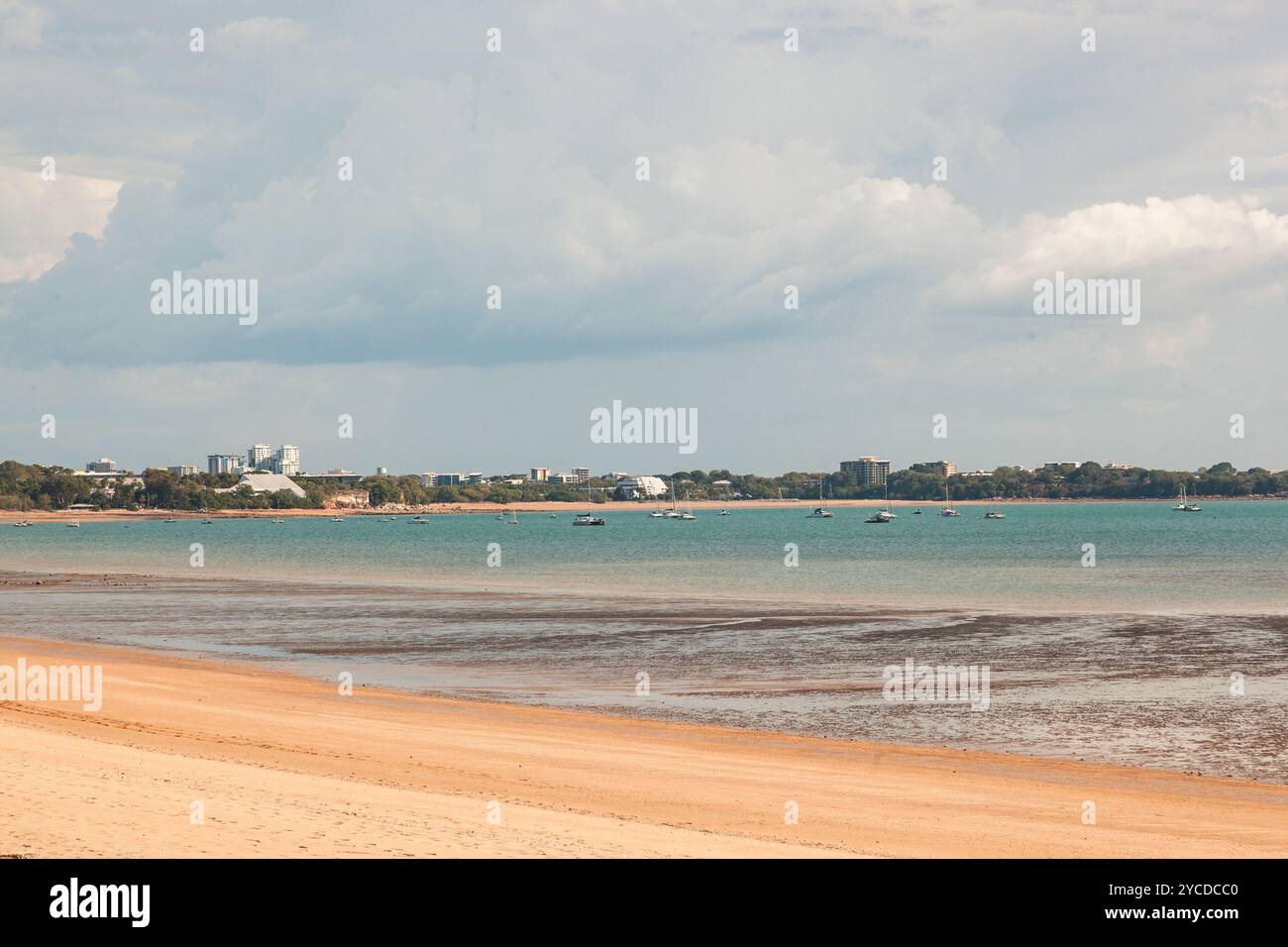 Visitors enjoy the serene beaches of Darwin, Northern Territory, with ...