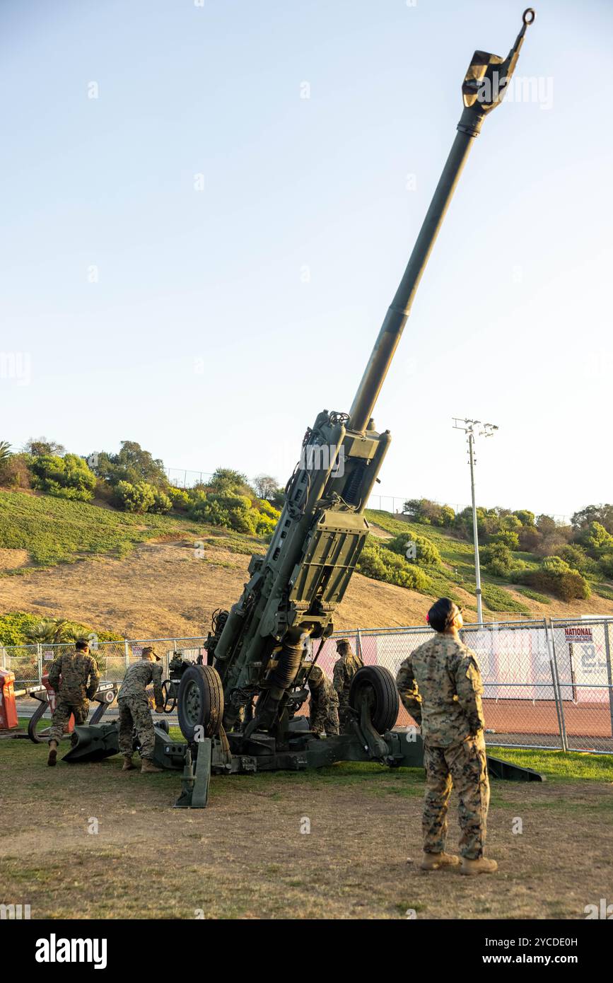 U.S. Marines with 1st Marine Division raise an M777A2 lightweight 155 ...