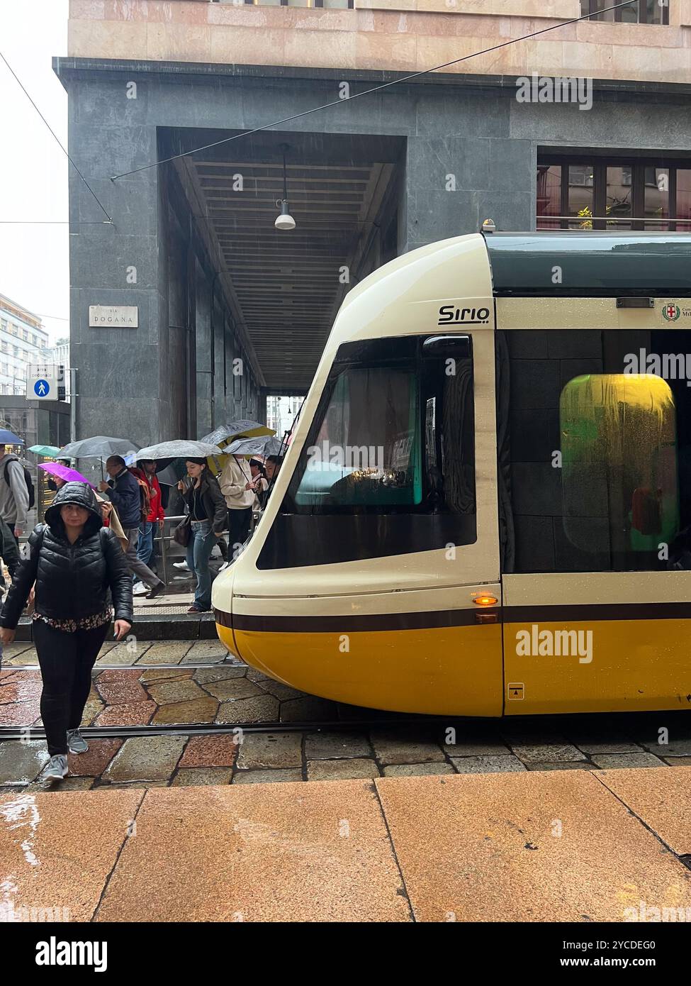 Trams on the street in Milan, Italy Stock Photo - Alamy