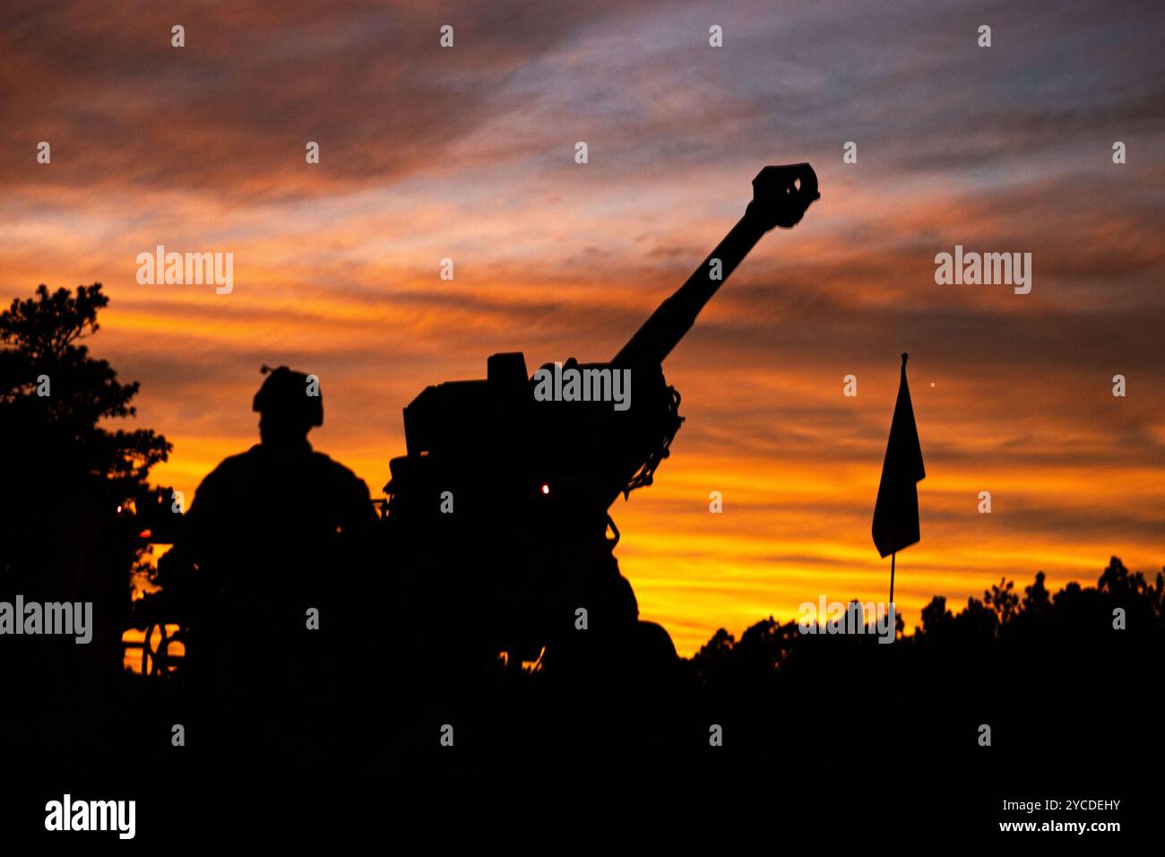 U.S. Marines with 2d Battalion, 10th Marine Regiment, 2d Marine Division practice setting up an ...