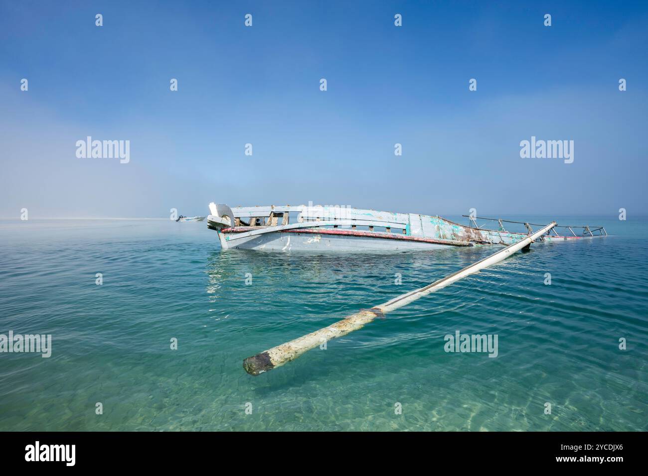Wreck of sailing ship in clear water on a misty morning, Moon Point ...