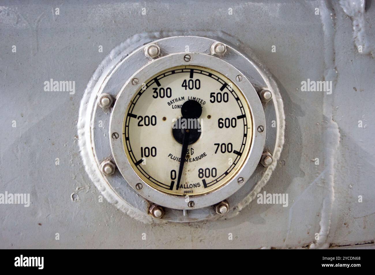 A fuel gauge, manufactured by Bayham Limited, London, on the exterior ...