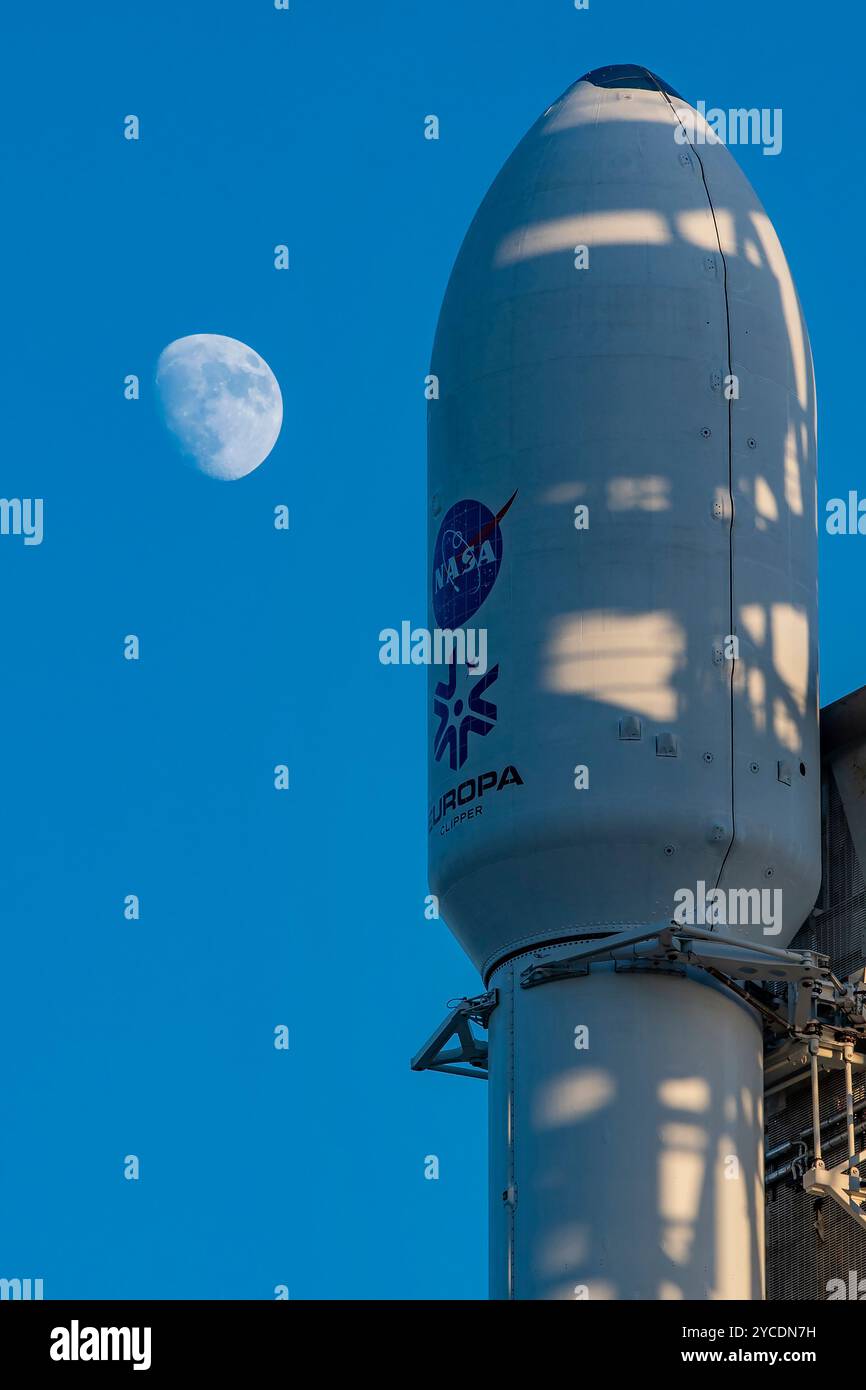 Moon behind NASA's Europa Clipper spacecraft, which is encapsulated in ...