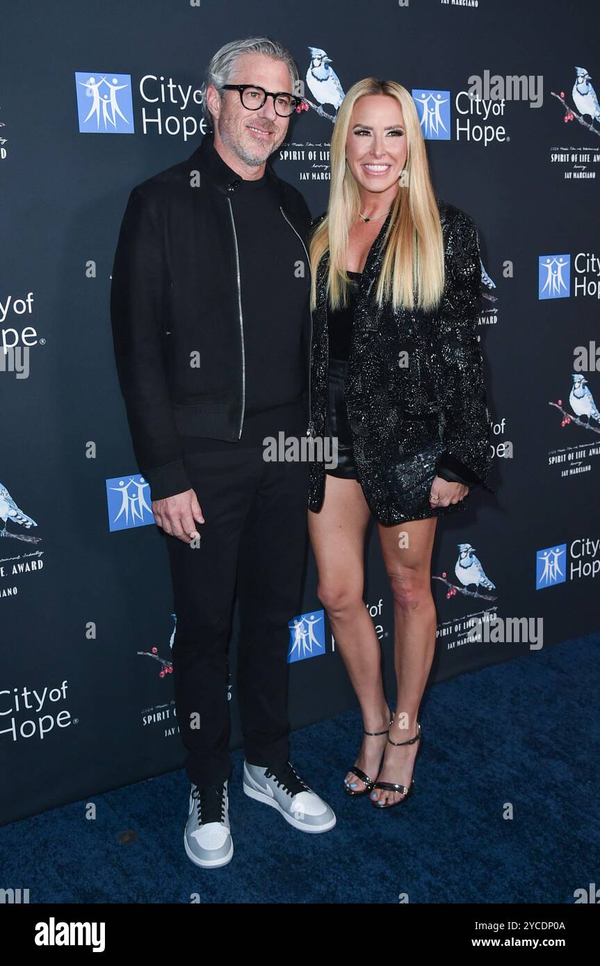 Casey Wasserman, left, and Jenny Chandler arrive at the City of Hope ...