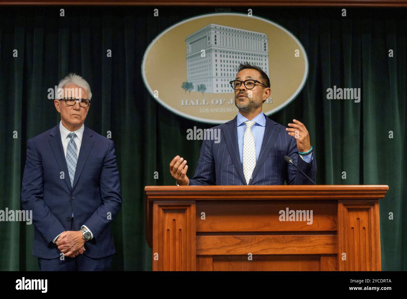 Los Angeles County District Attorney George Gascon, left, and attorney Matthew Lombard take ...