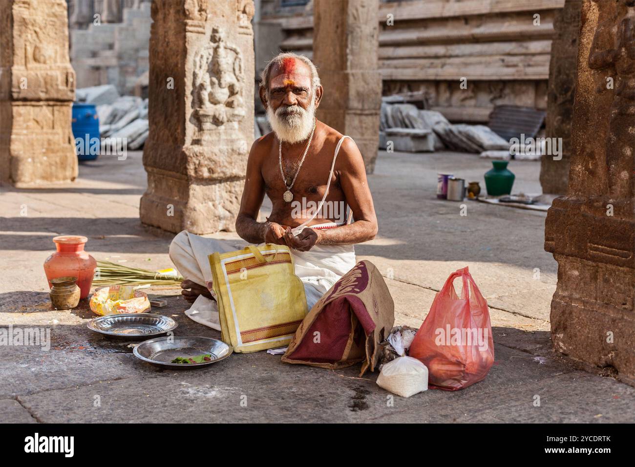 Indian brahmin traditional Hindu society priest with donation in famous ...