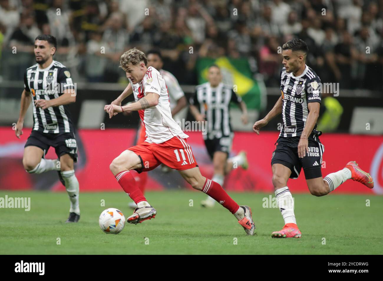 Facundo Colidio of Argentina's River Plate carries the ball followed by Fausto Vera of Brazil's ...