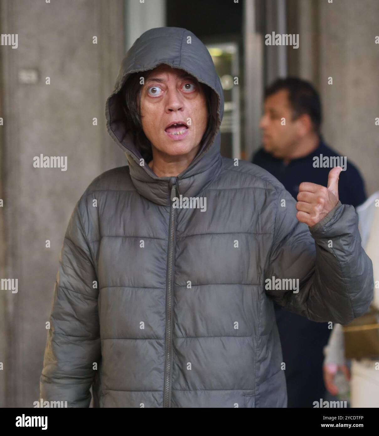 The Lizard Woman with her disturbing look walks through the streets of ...