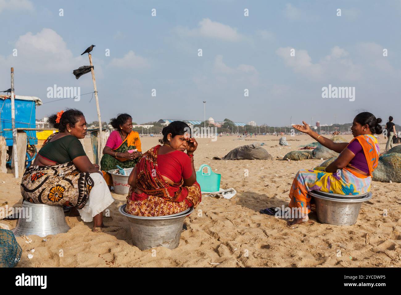 Local Indian women on Marina beach in Chennai. Marina beach is the ...