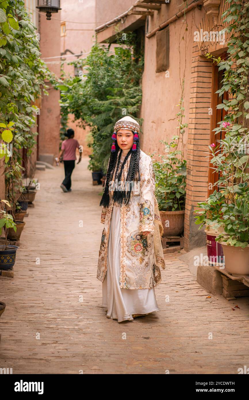 Kashgar, Xinjiang, China - JULY, 17, 2023: A girl wearing Uighur ...