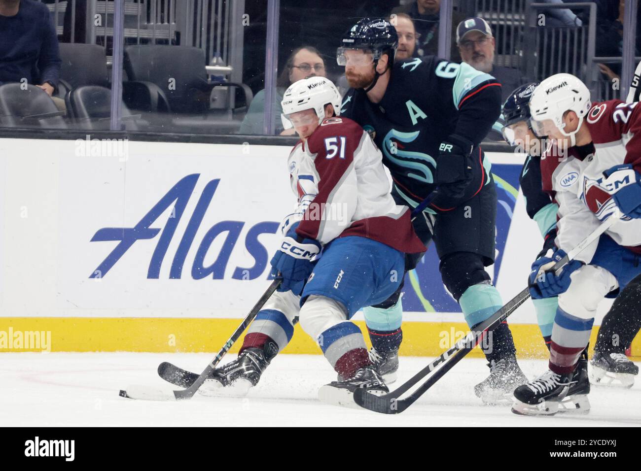 Colorado Avalanche right wing Nikolai Kovalenko (51) works to control ...