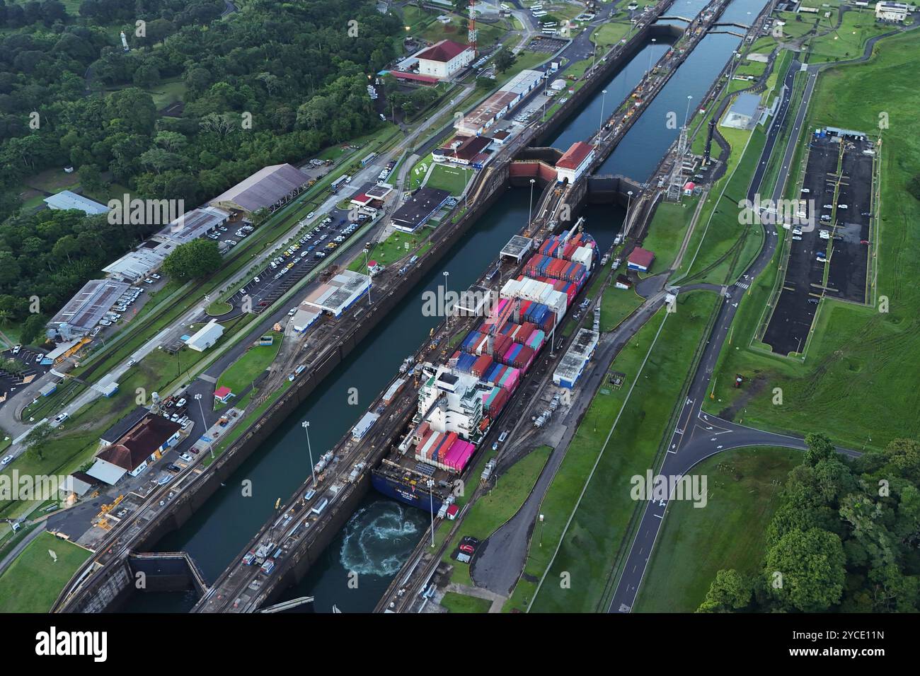 A cargo ship traverses the Agua Clara Locks of the Panama Canal in ...