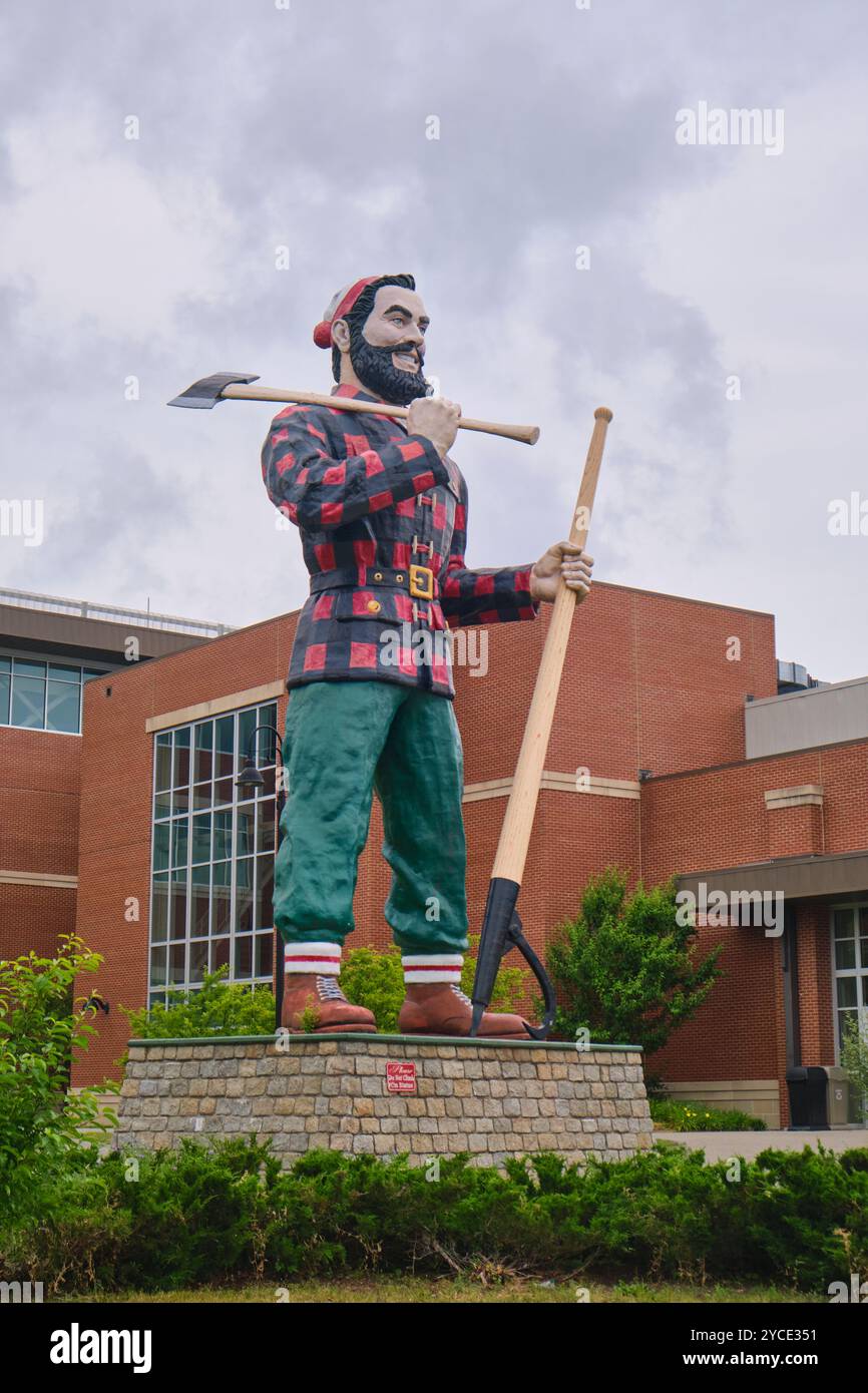 Huge, large, tall Paul Bunyan statue in moody, cloudy, scary, grey ...