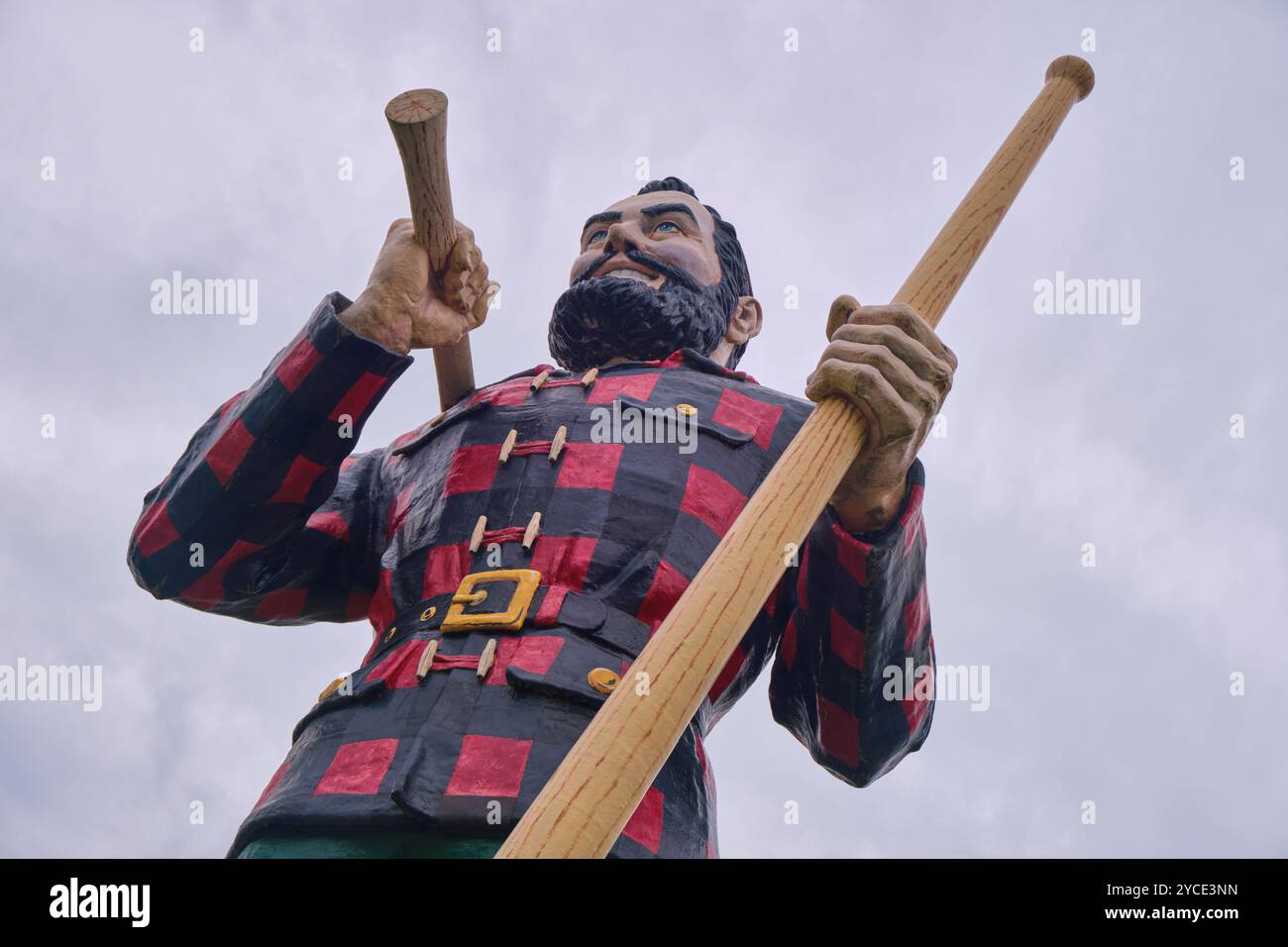 Huge, large, tall Paul Bunyan statue in moody, cloudy, scary, grey ...