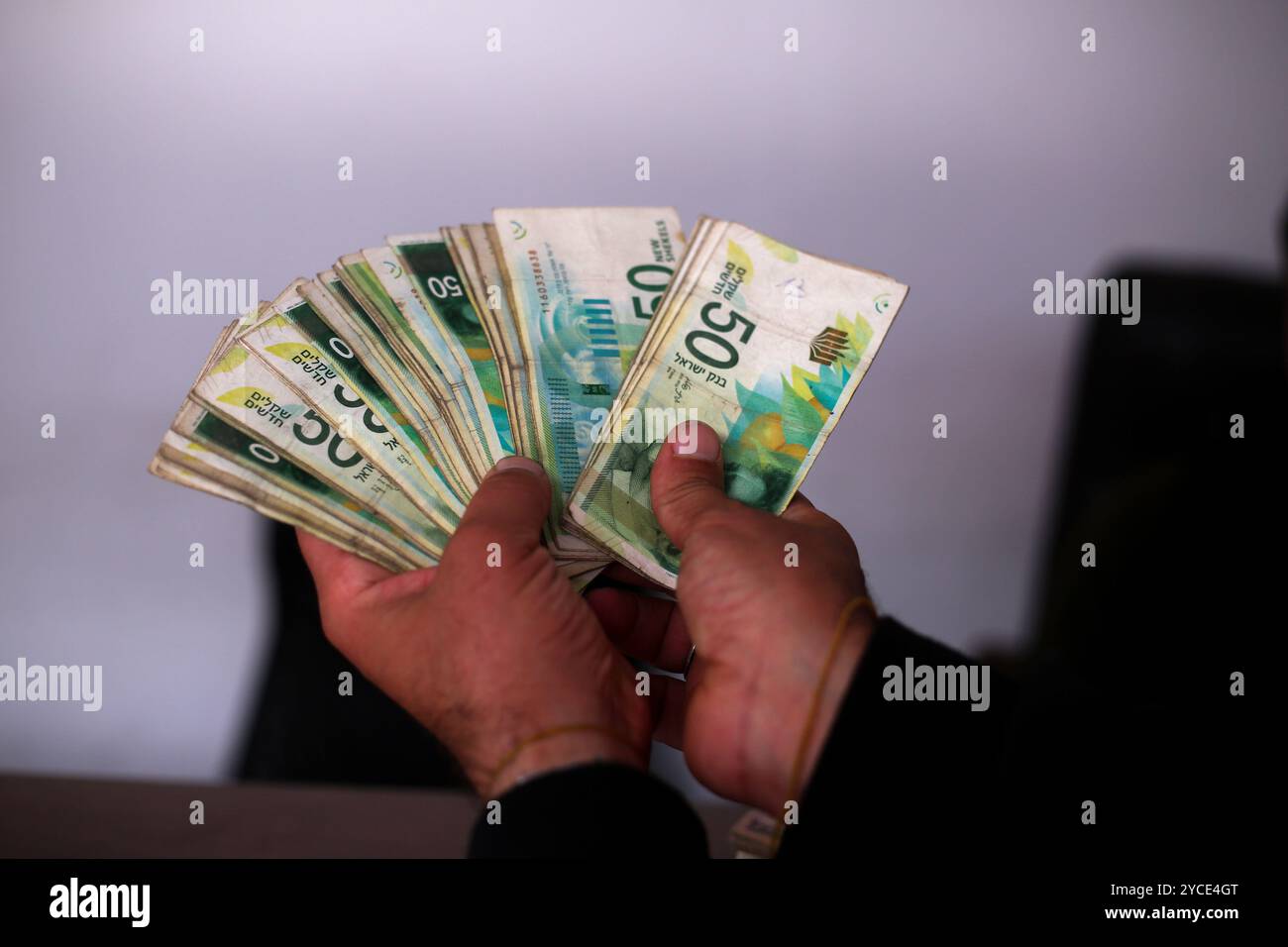 Gaza, Palestine. Israeli new shekel banknotes in different ...