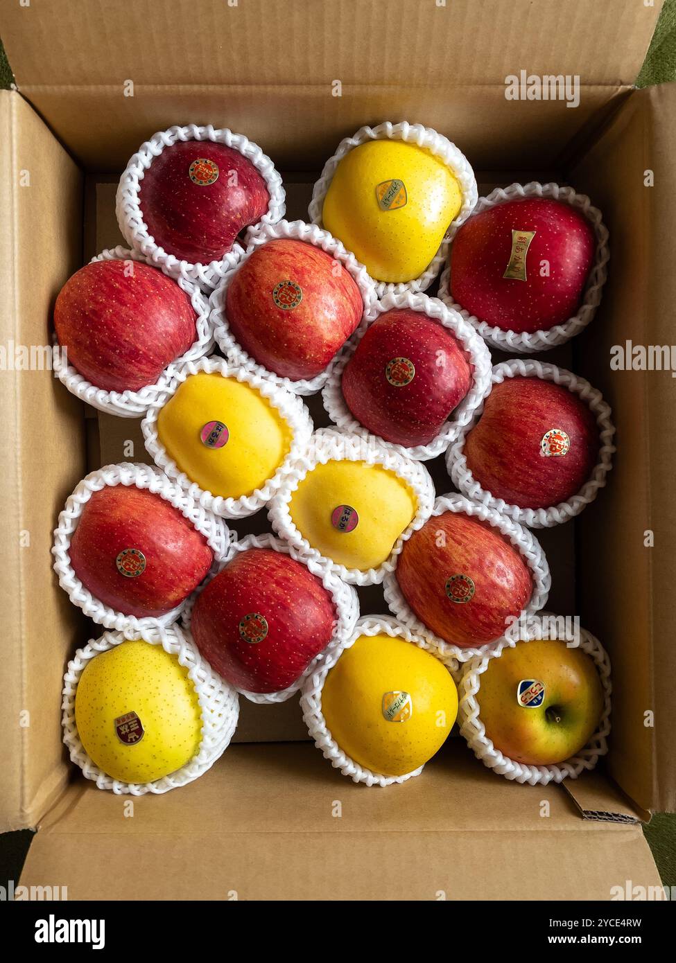 This box includes different varieties of apple like Haruka, Sunfuji ...