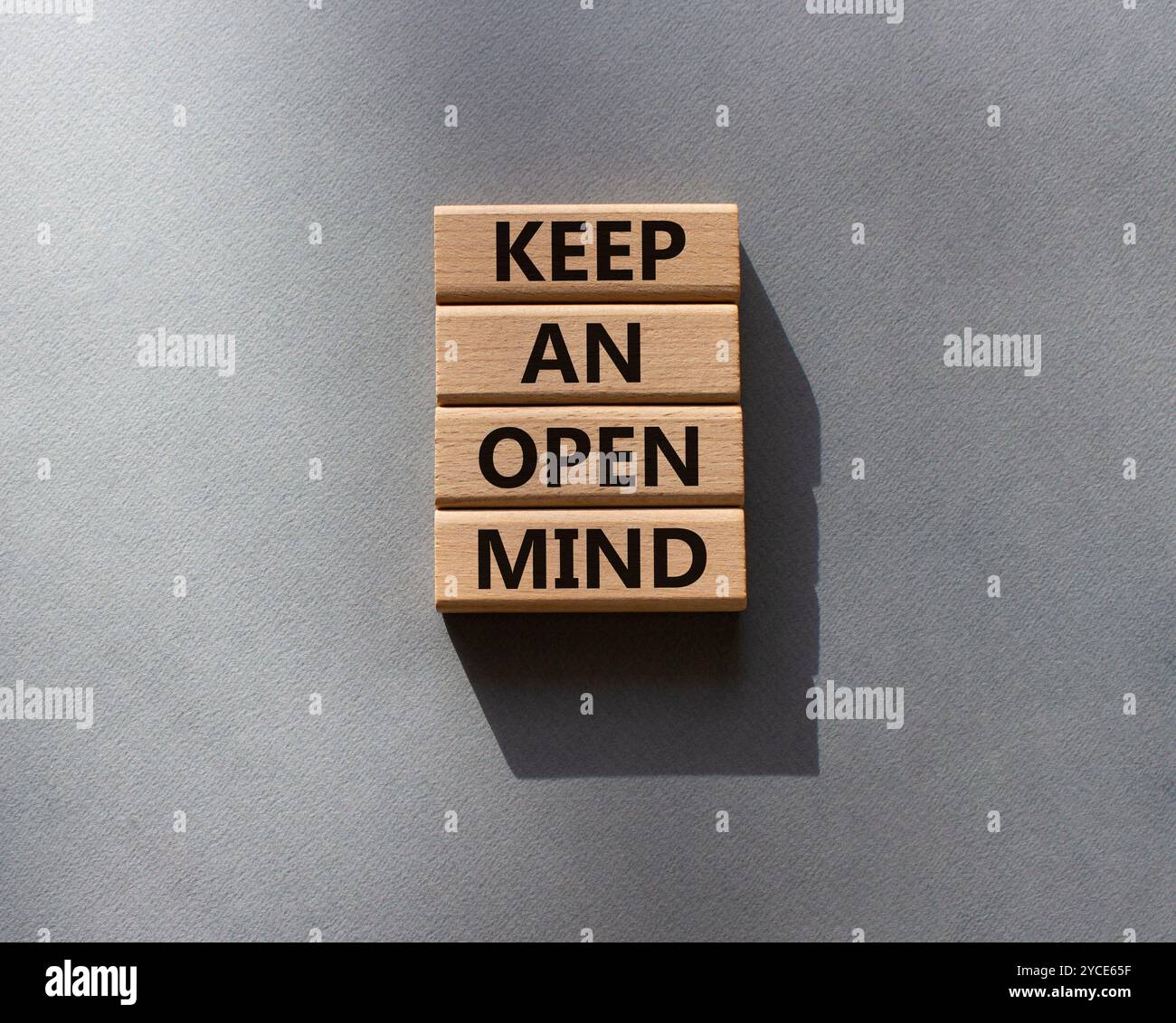 Keep an open mind symbol. Wooden blocks with words Keep an open mind ...