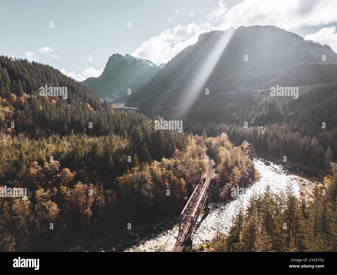 A railroad bridge over the Skyhomish River in the Washington Cascades ...
