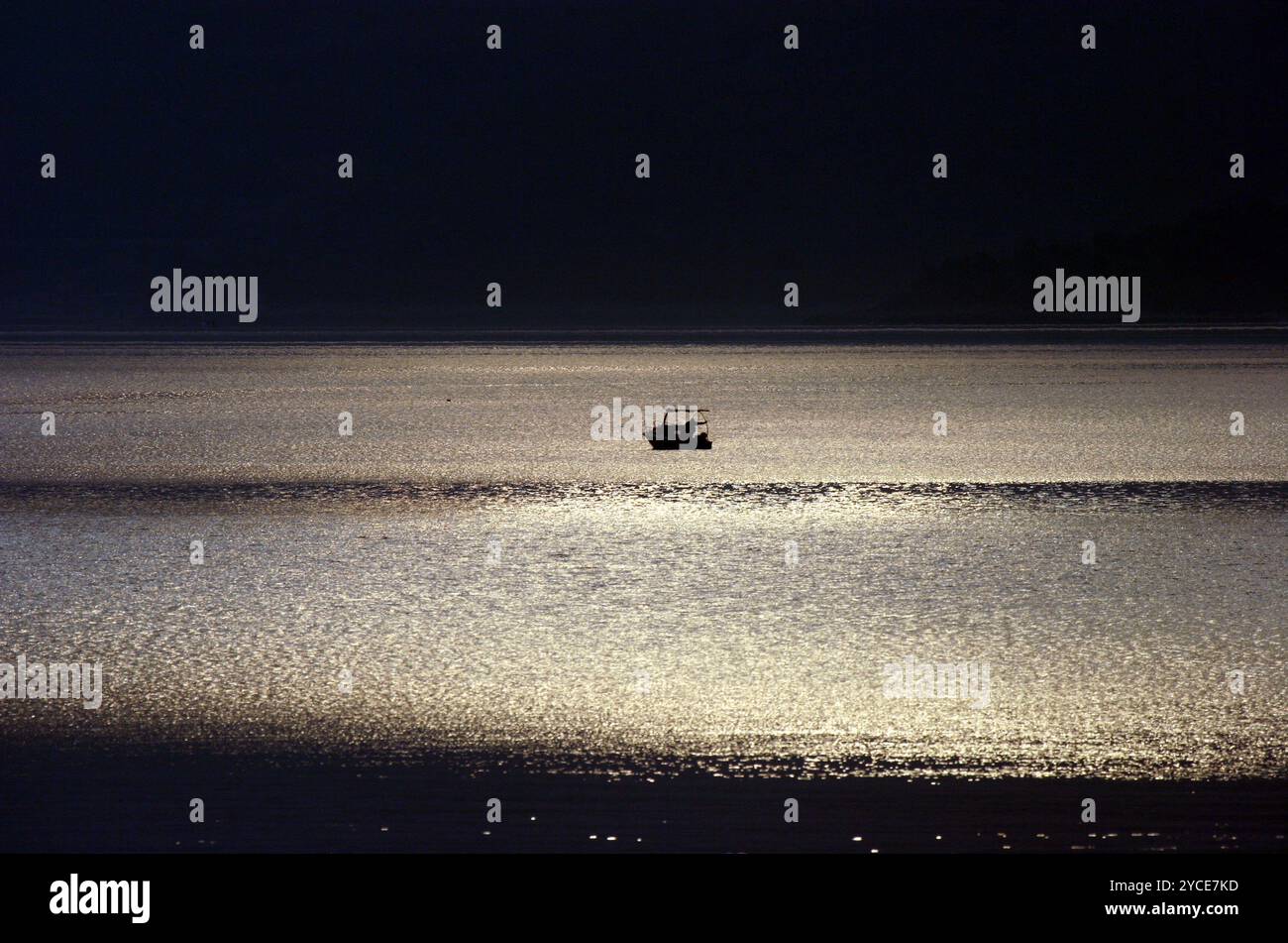 Fisherman in night Stock Photo - Alamy
