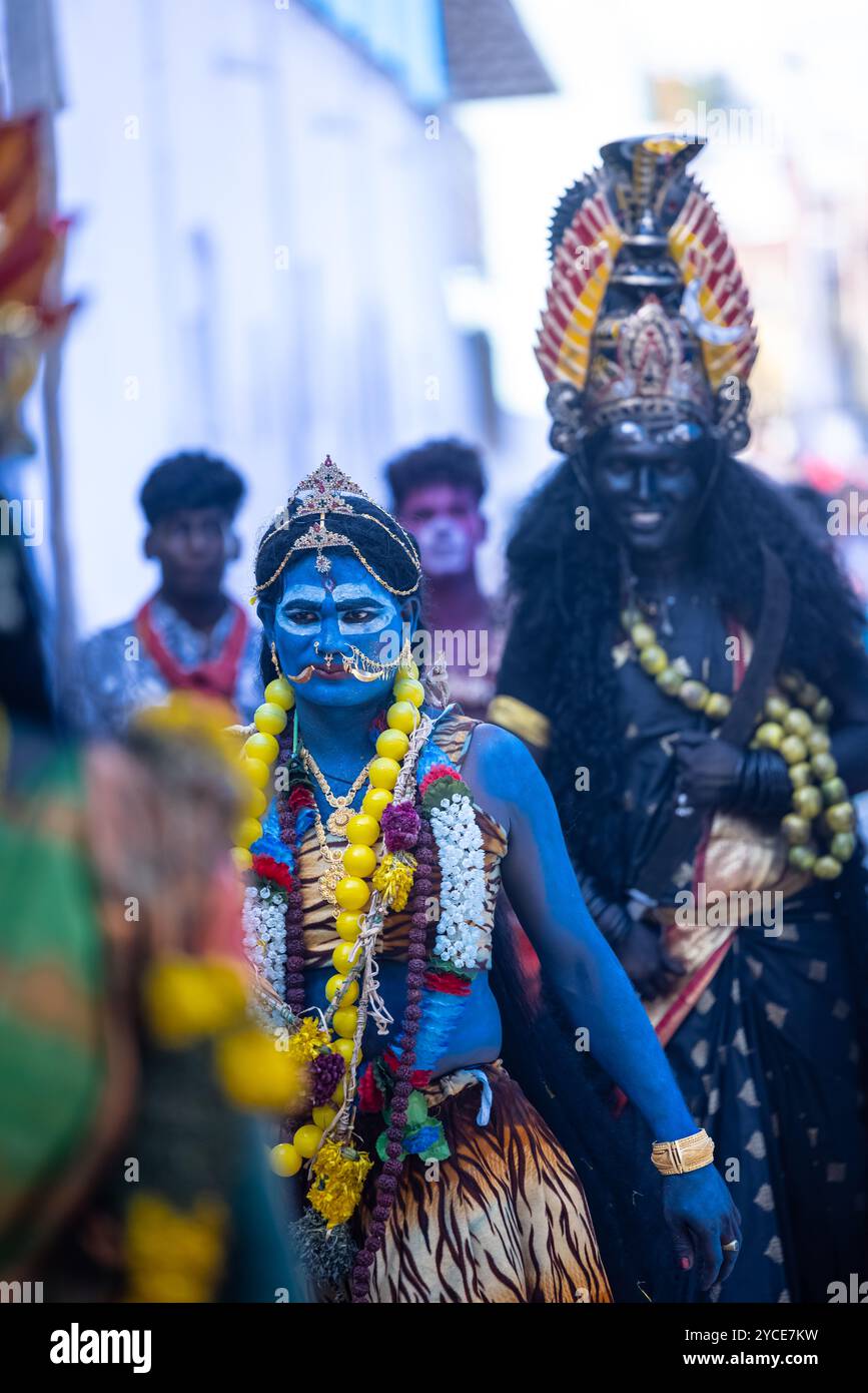 Kulasai Dasara, Portrait of indian hindu devotee with painted face and ...